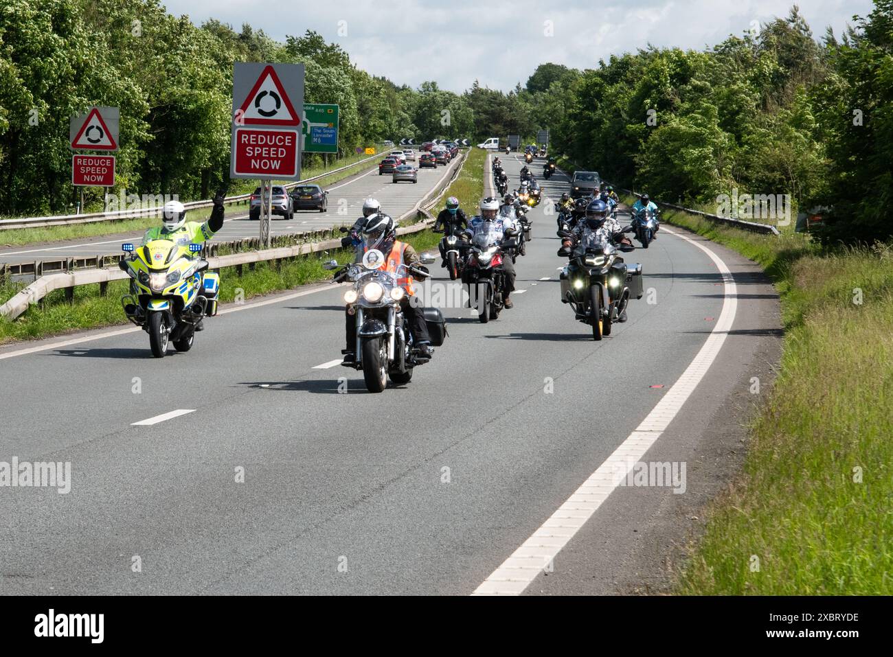 Motorcycles on the "Dave Day" ride on the A591, Cumbria. "Dave Day" saw ...