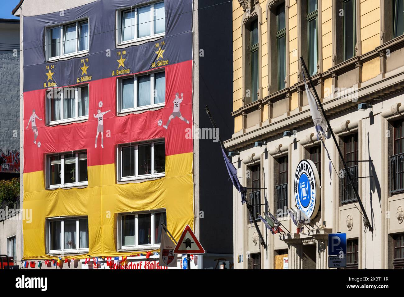 with a huge German flag covered house on the occasion of the UEFA ...