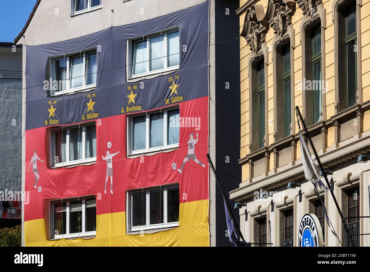 with a huge German flag covered house on the occasion of the UEFA ...