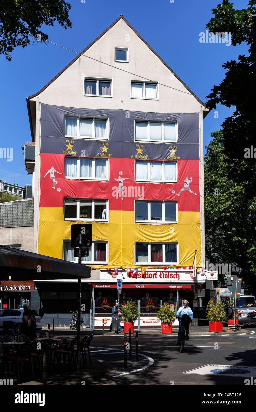 with a huge German flag covered house on the occasion of the UEFA ...