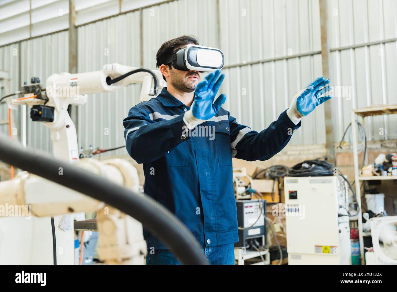 Engineer controlling automated production line hi-res stock photography ...