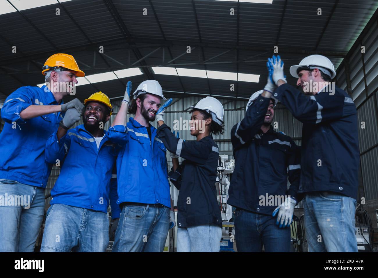 Team of successful group of male and female, corporate workers stand ...