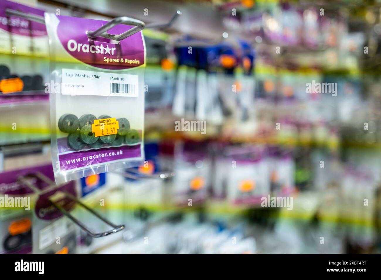 A plastic packet of tap washers on sale in an independent DIY trade ...