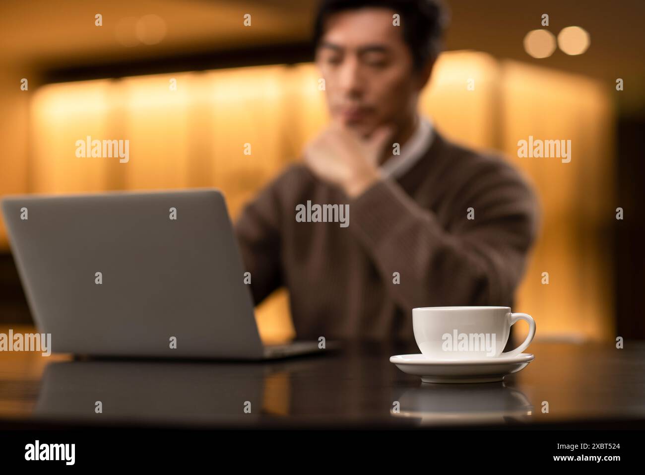 Serious man from east working hi-res stock photography and images - Alamy