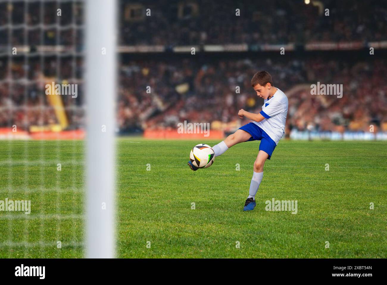 Child scoring goal hi-res stock photography and images - Alamy