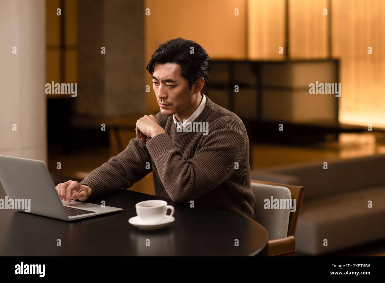Chinese Businessman Working From Home Stock Photo - Alamy