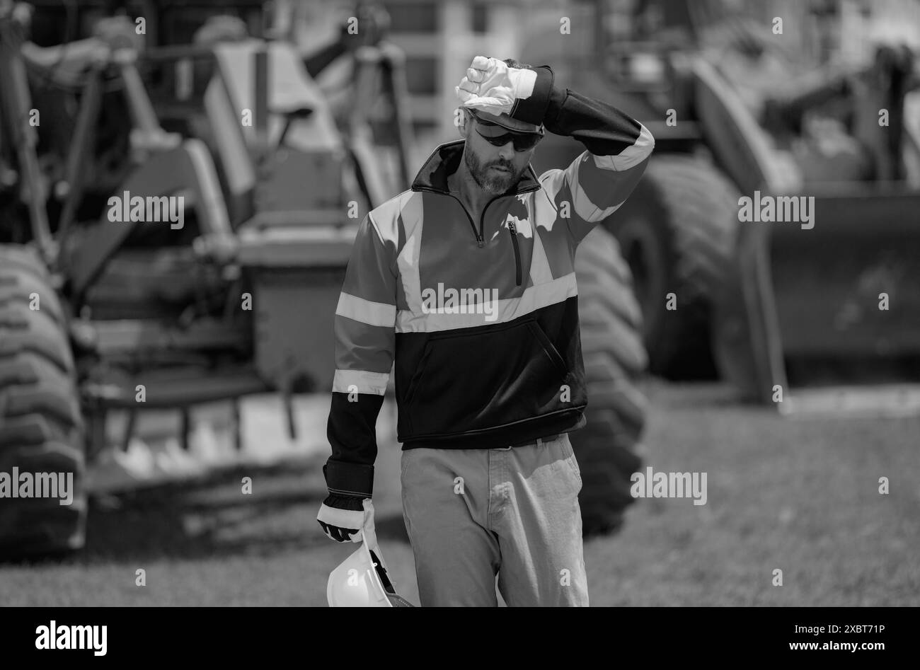 Machinery builder at buildings background. Excavator loader tractor and ...