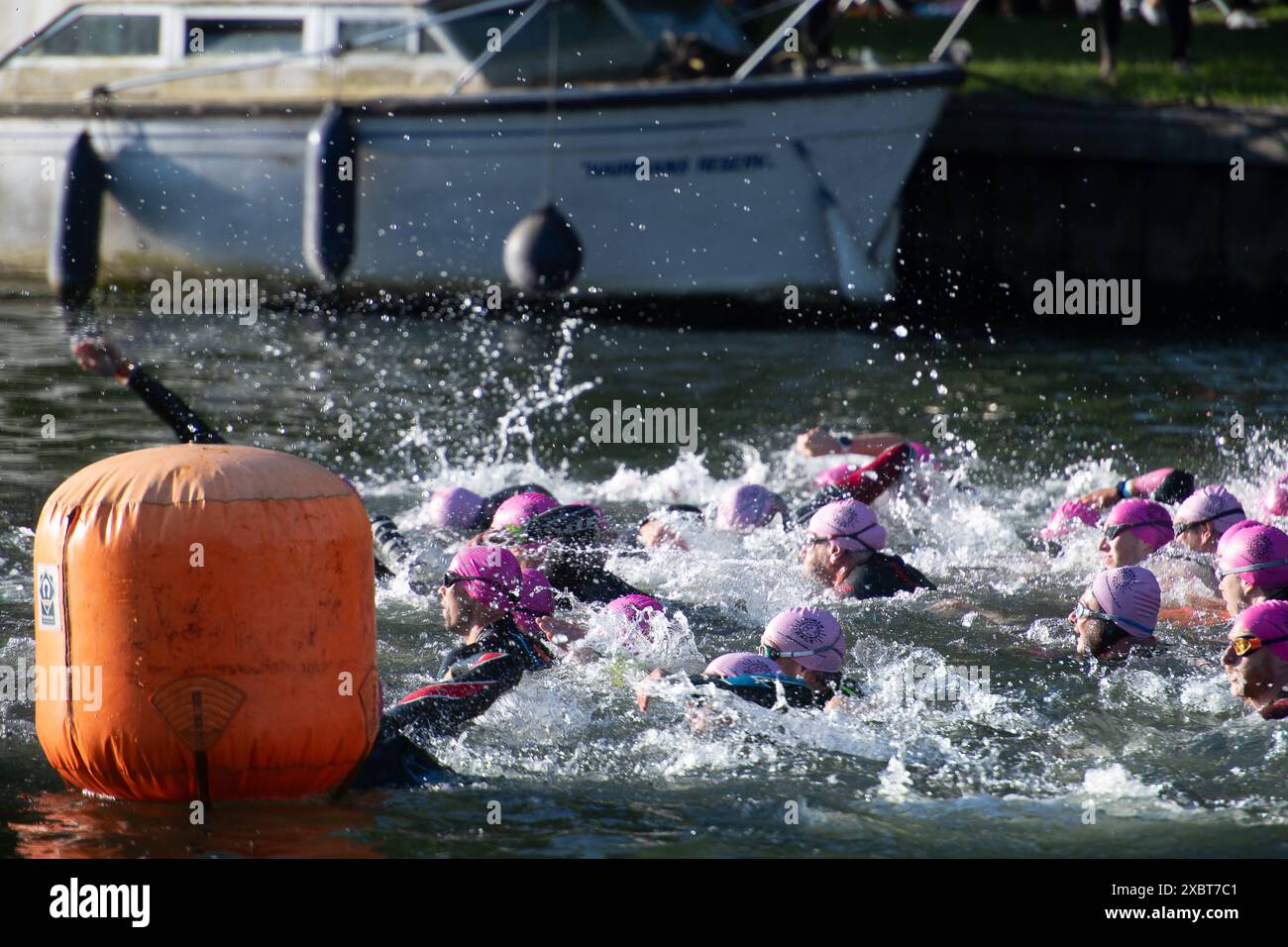 FILE PICS. 13th June, 2024. Triathletes swimming in the River Thames in ...