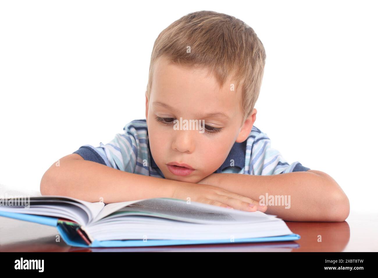 little boy reading a book on white background Stock Photo - Alamy