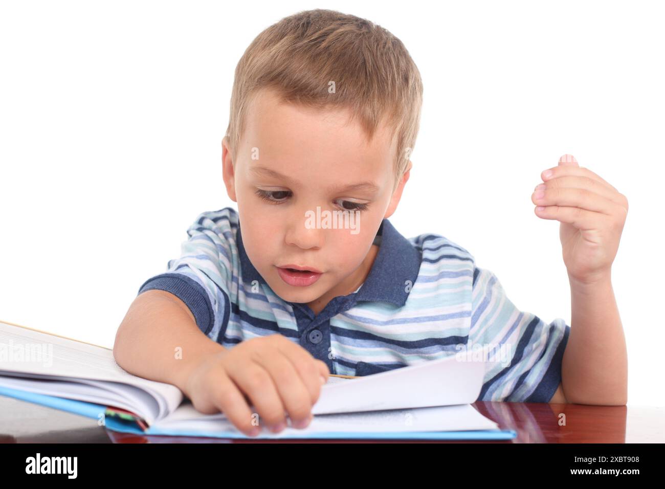 little boy reading a book on white background Stock Photo - Alamy