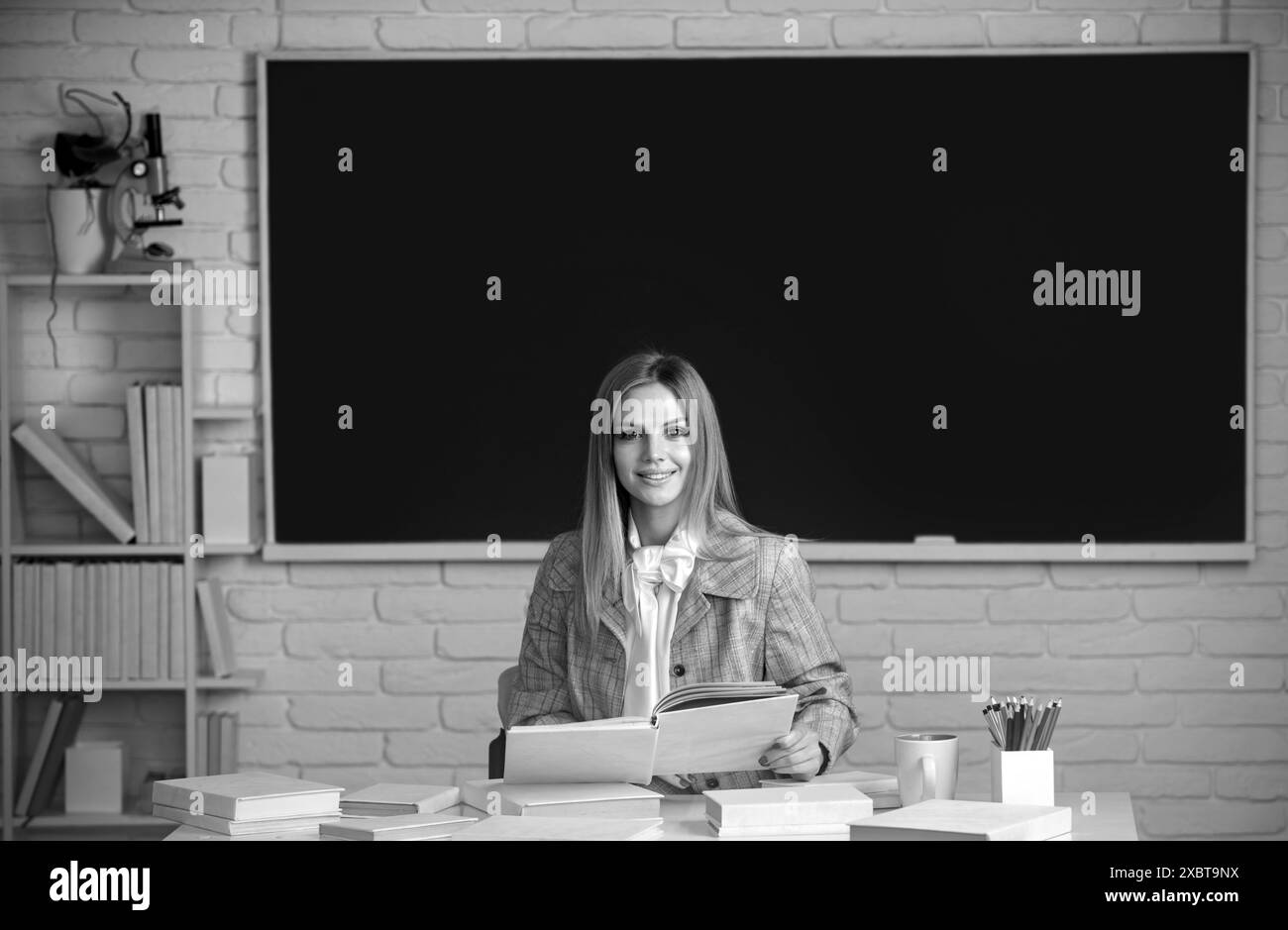 Female student on lesson lecture in classroom at high school or college ...