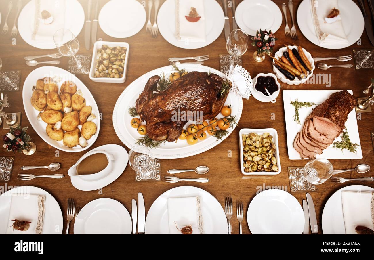 Above, table and lunch with food or turkey chicken in home for family ...