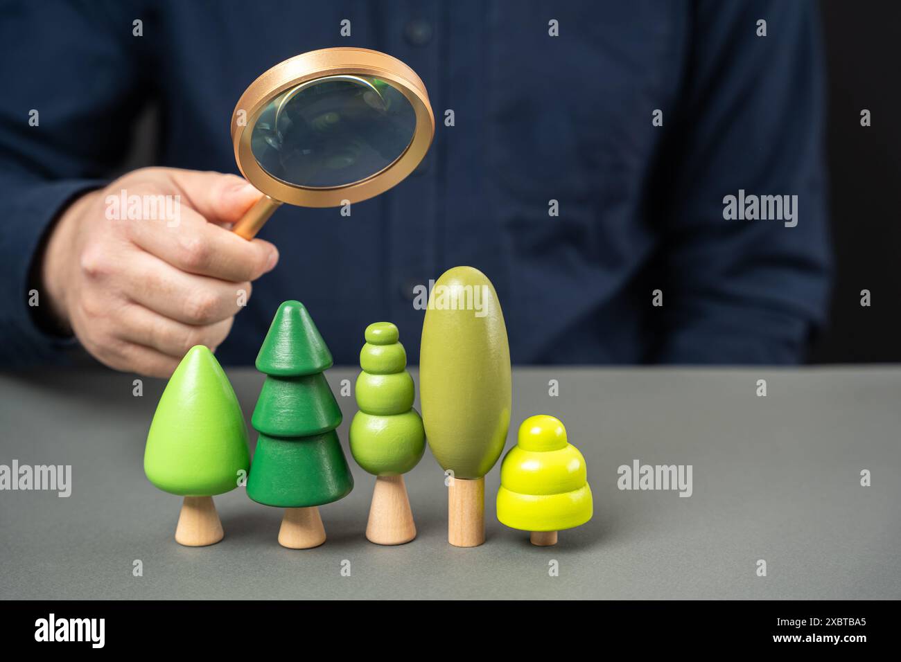 Person holds magnifying glass test hi-res stock photography and images ...
