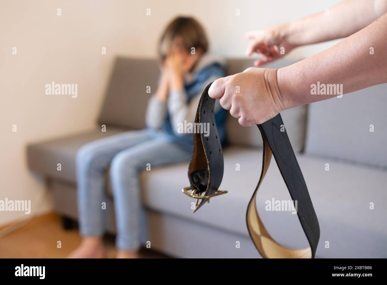 Punishment belt hi-res stock photography and images - Alamy