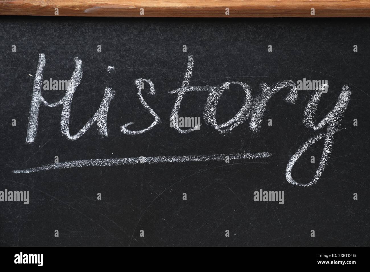 Word History written with chalk on blackboard Stock Photo - Alamy
