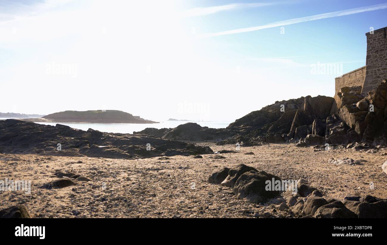 Sant Malo beach in sunny weather at low tide with beautiful blue sky ...