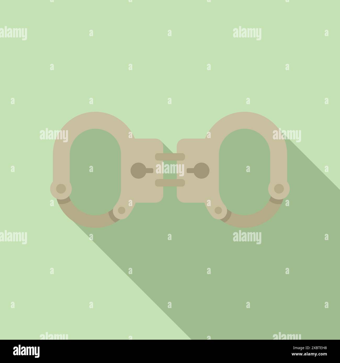 Pair of metal handcuffs lying closed, representing law enforcement and ...