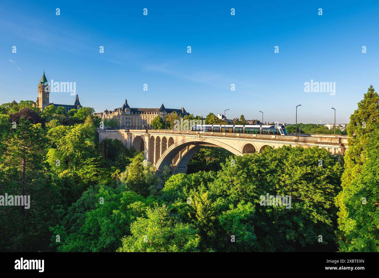 Scenery of Adolphe Bridge and the clock tower in Luxembourg city ...