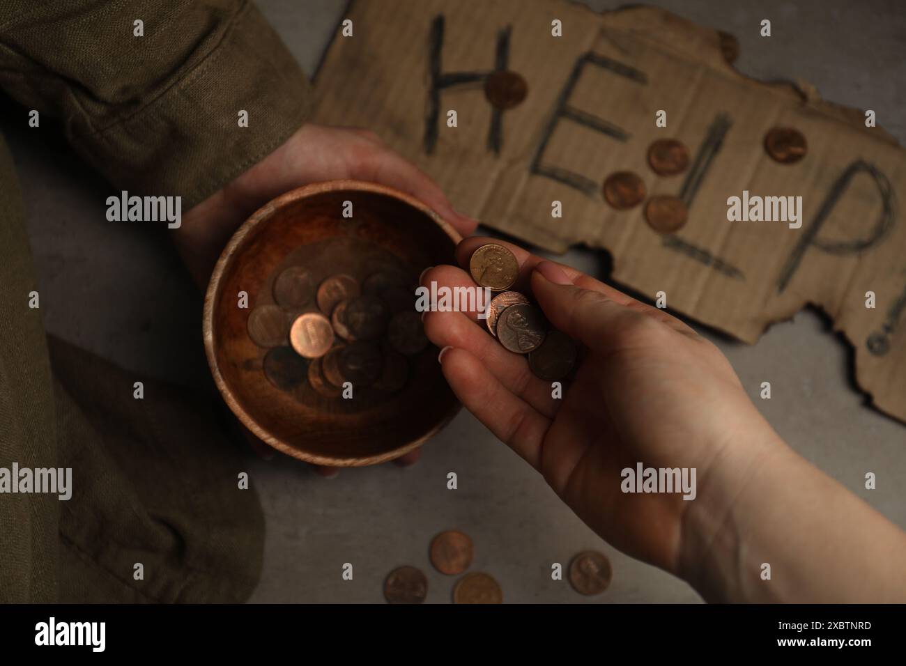 Woman giving sharing donation hi-res stock photography and images - Alamy