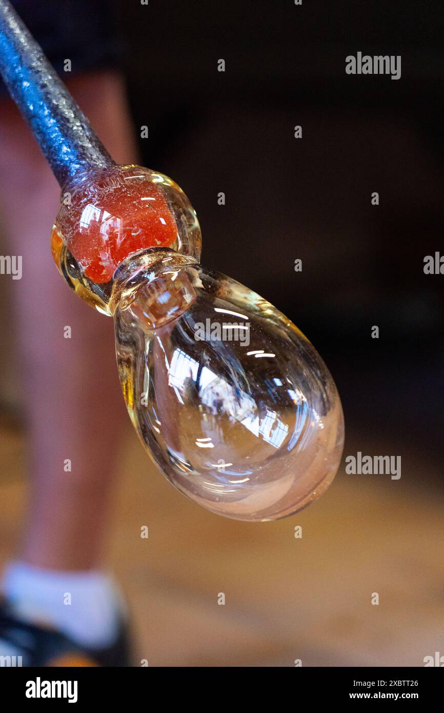 Blown glass in the creation process Stock Photo - Alamy