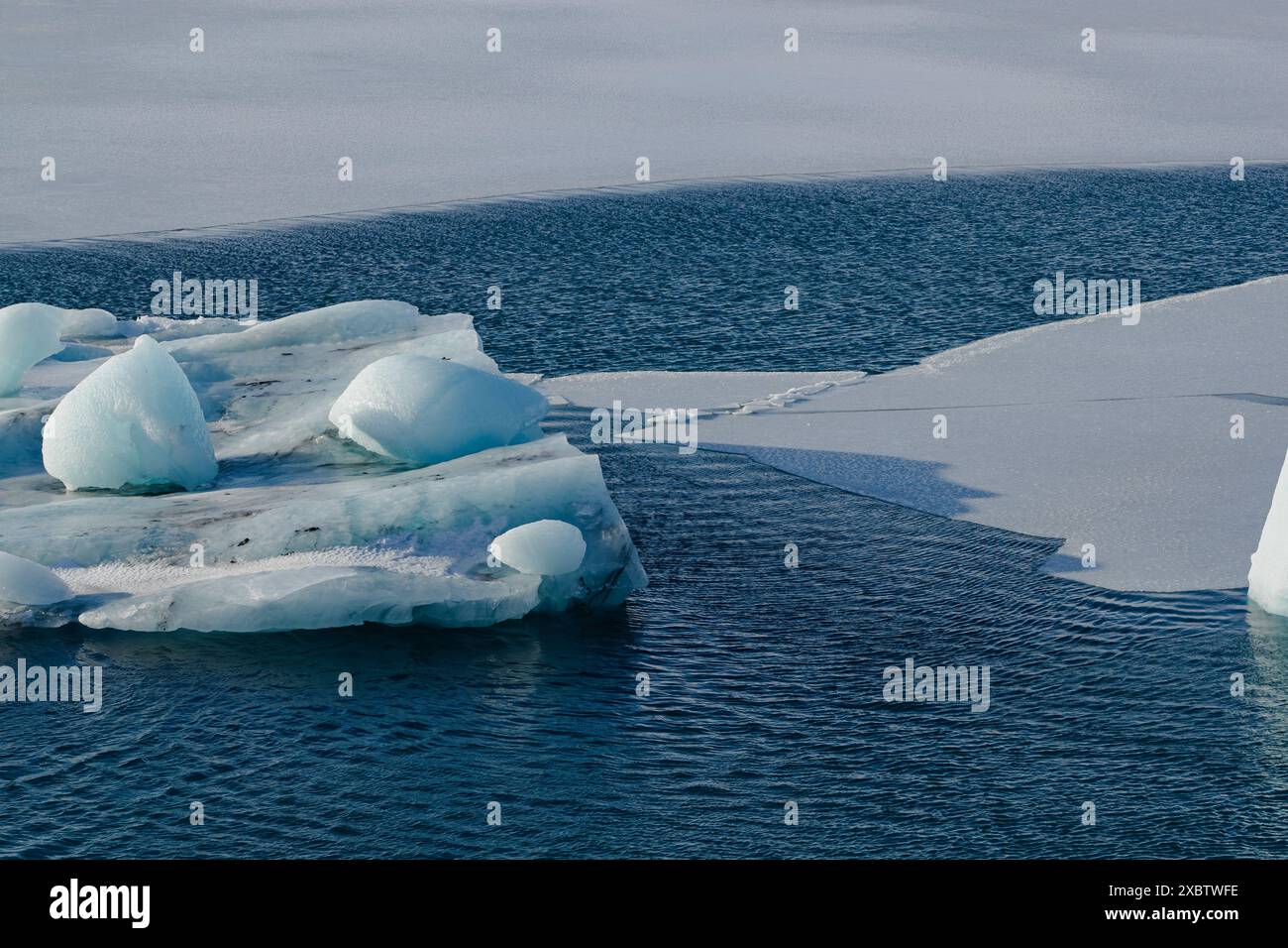 Dynamic view of icebergs in arctic waters Stock Photo - Alamy