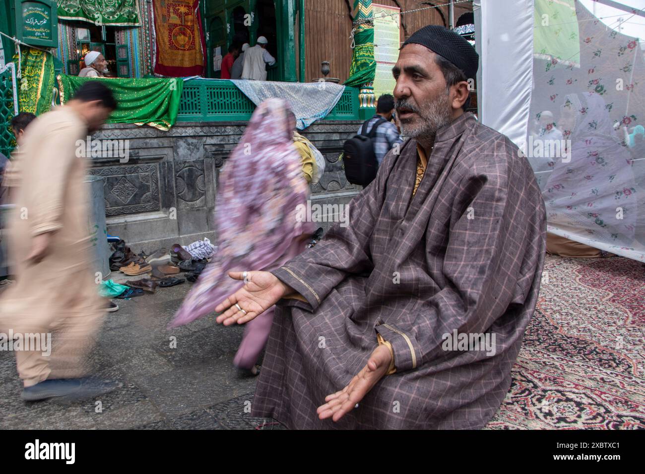 Srinagar, Jammu And Kashmir, India. 13th June, 2024. A Kashmiri Muslim ...