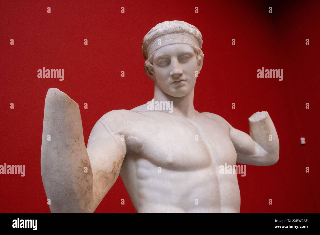 Antique white marble statue of the Diadumenos of Delos at the National ...