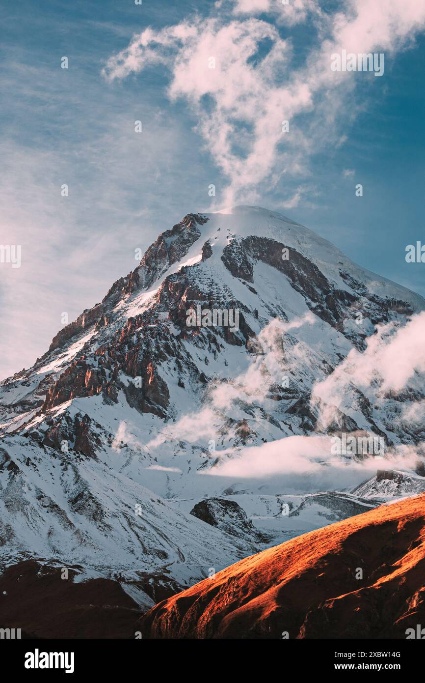 Georgia. Peak Of Mount Kazbek Covered With Snow. Kazbek Is A ...