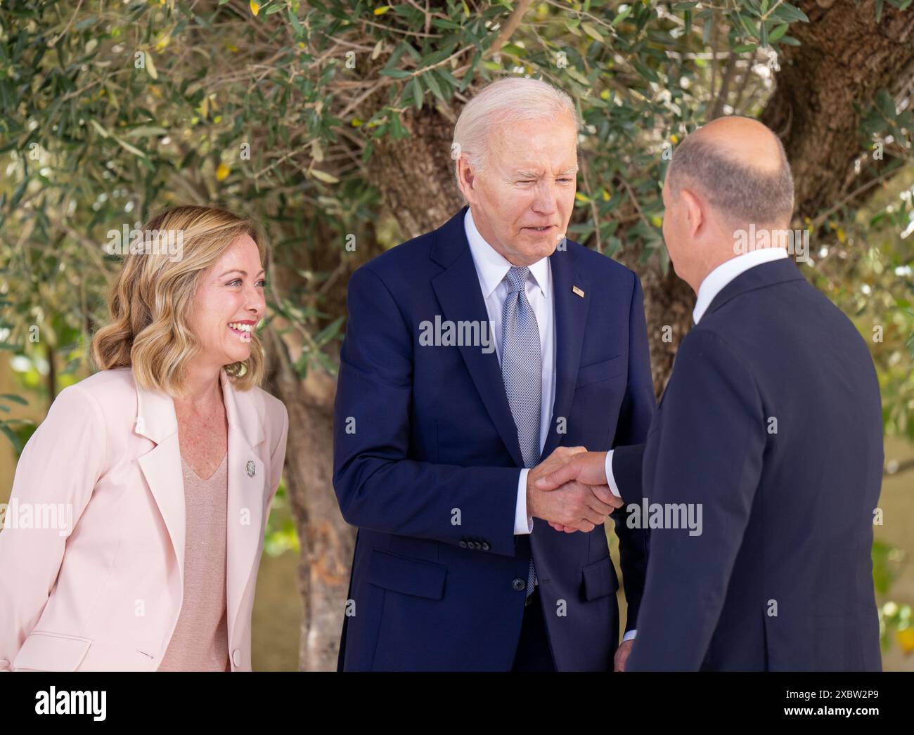 Bari, Italy. 13th June, 2024. US President Joe Biden (M), welcomes ...