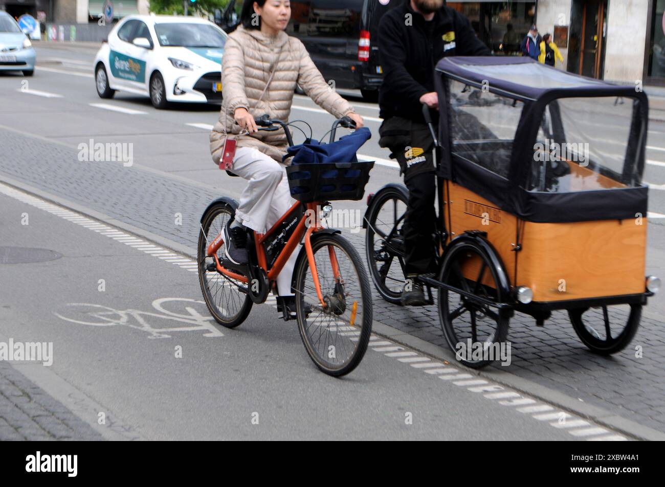 Copenhagen/ Denmark/11 JUNE 2024/ Cargo bikes are very popular in ...