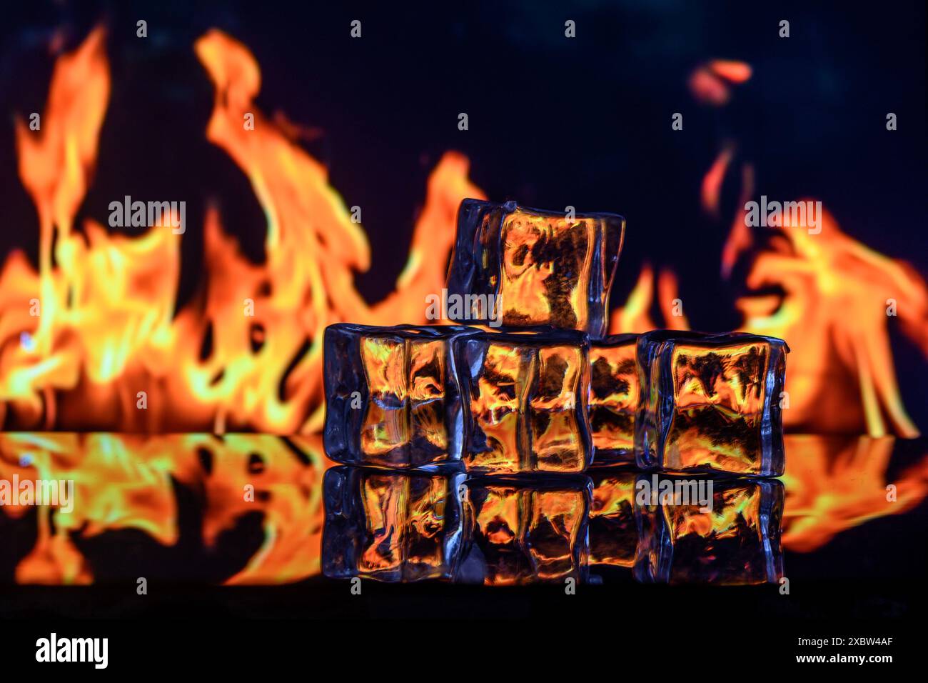 Burning ice cubes on black background 4 Stock Photo - Alamy