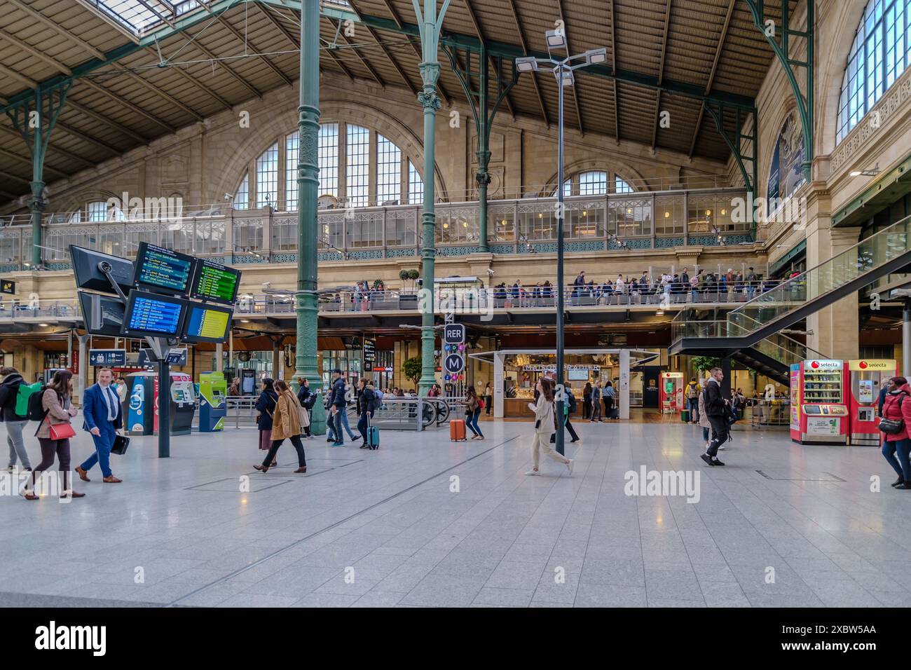 Paris, France - May 17, 2024 : View of various tourists at the central ...