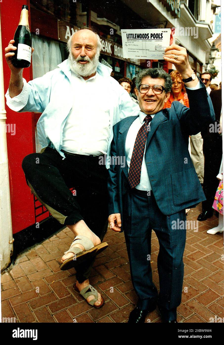 ACTOR AND COMEDIAN BILL MAYNARD PRESENTS A CHEQUE TO POOLS WINNERS ...
