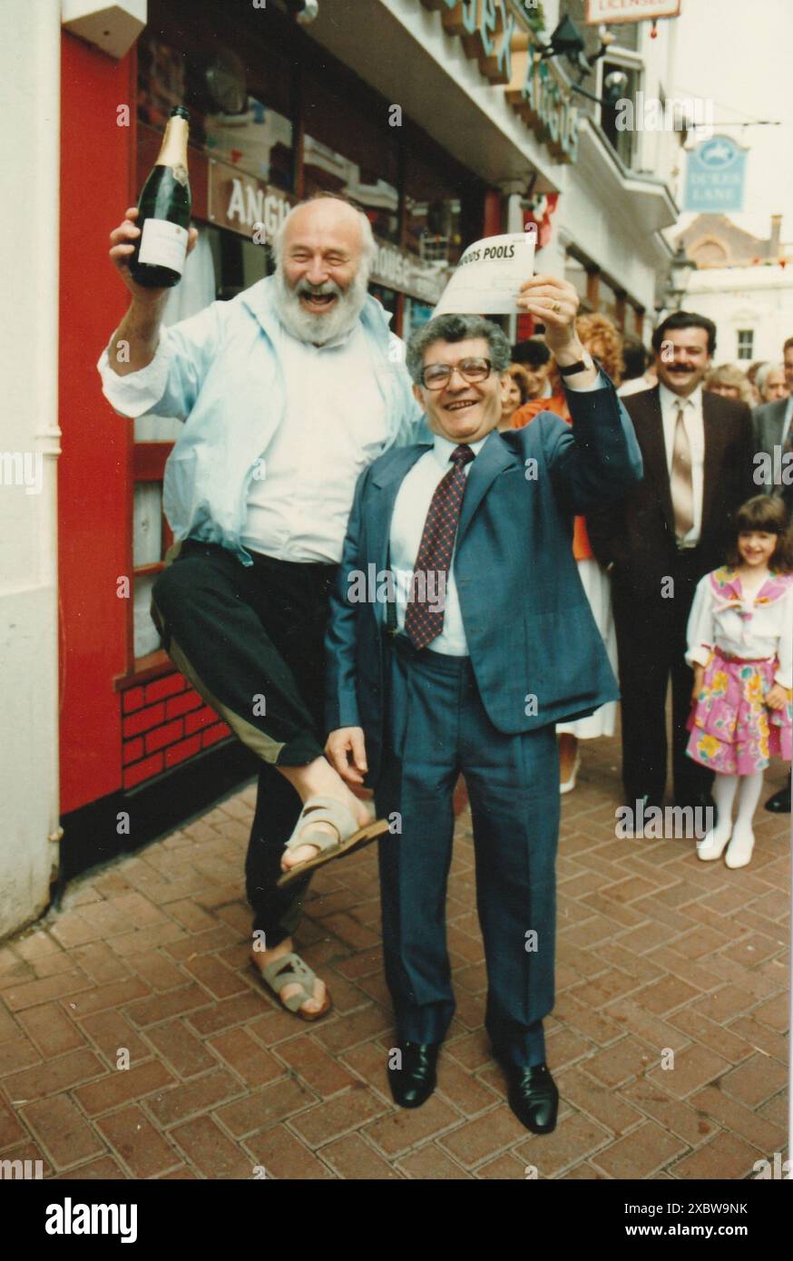 ACTOR AND COMEDIAN BILL MAYNARD PRESENTS A CHEQUE TO POOLS WINNERS ...
