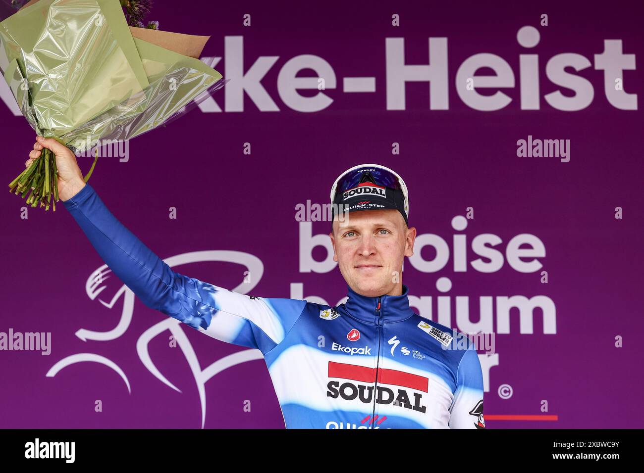 Belgian Tim Merlier of Soudal Quick-Step celebrates on the podium after ...