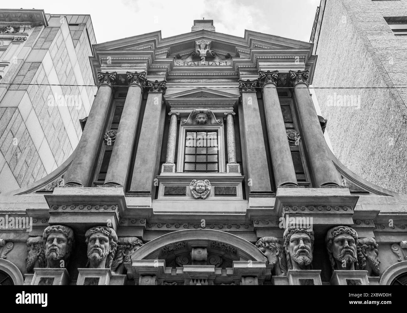 Low-angle view of the medieval church of San Raffaele, decorated with ...