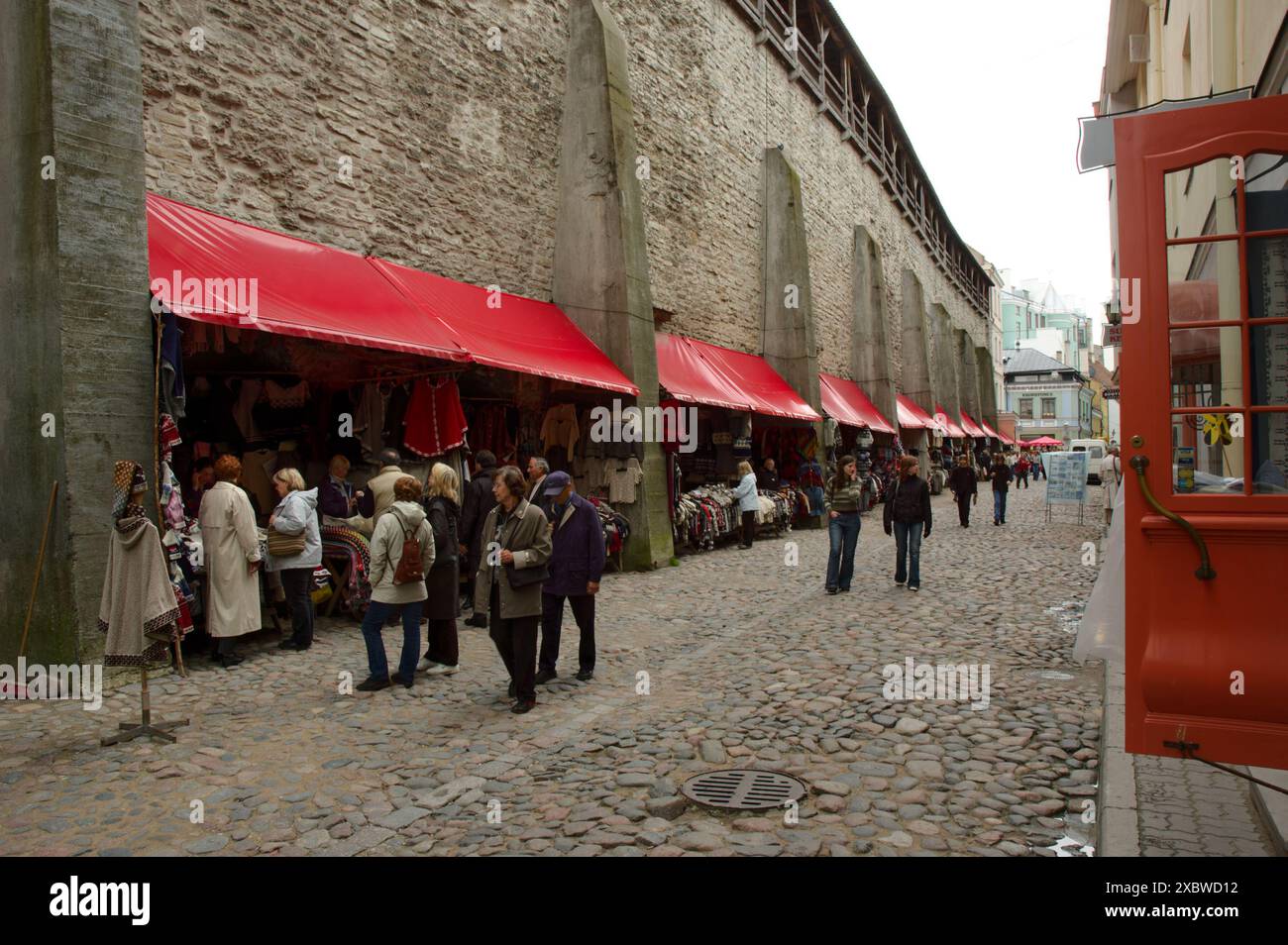 Market stalls along the ramparts of the Old Town wall in Tallinn ...