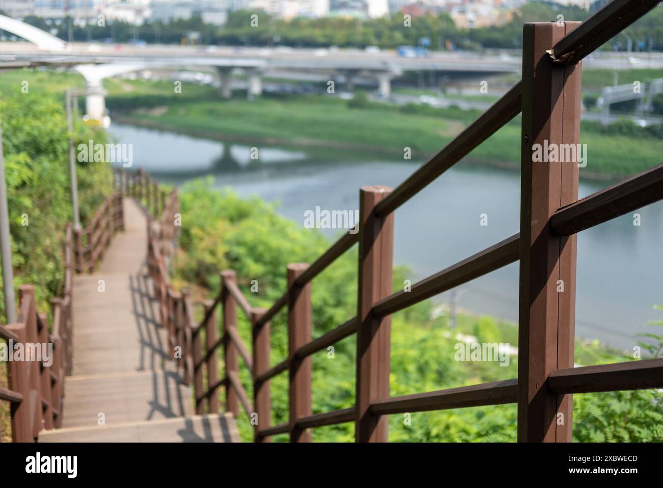 Wooden path on Eungbongsan mountain with view of Han river in Seoul ...