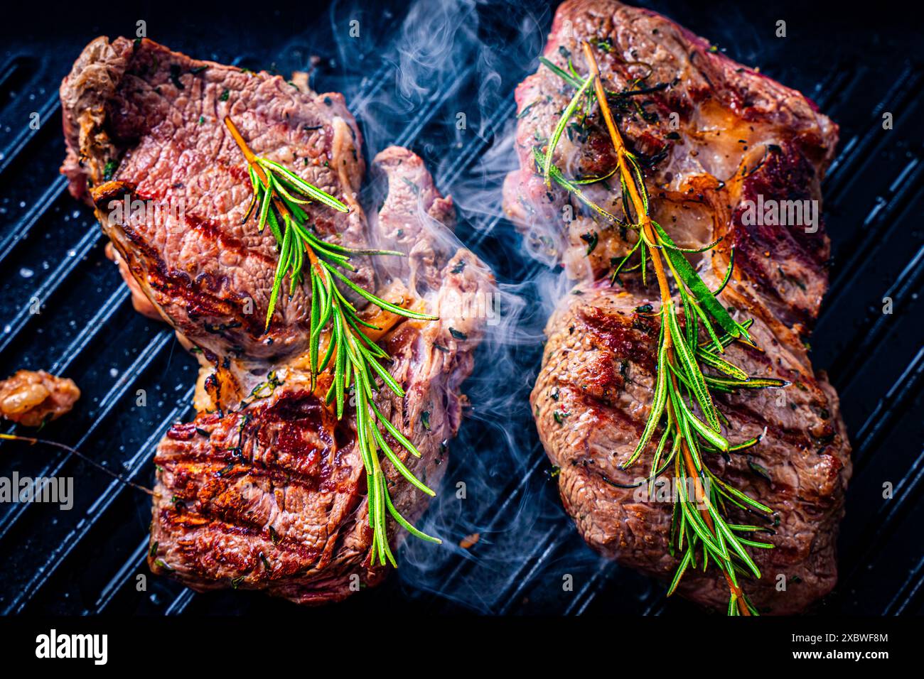 Juicy grilled beef steaks hi-res stock photography and images - Alamy
