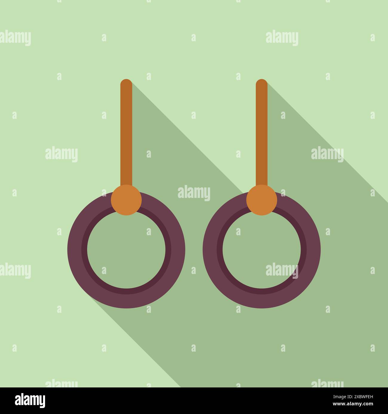 Two empty gymnastic rings are hanging from wooden mounts against a ...