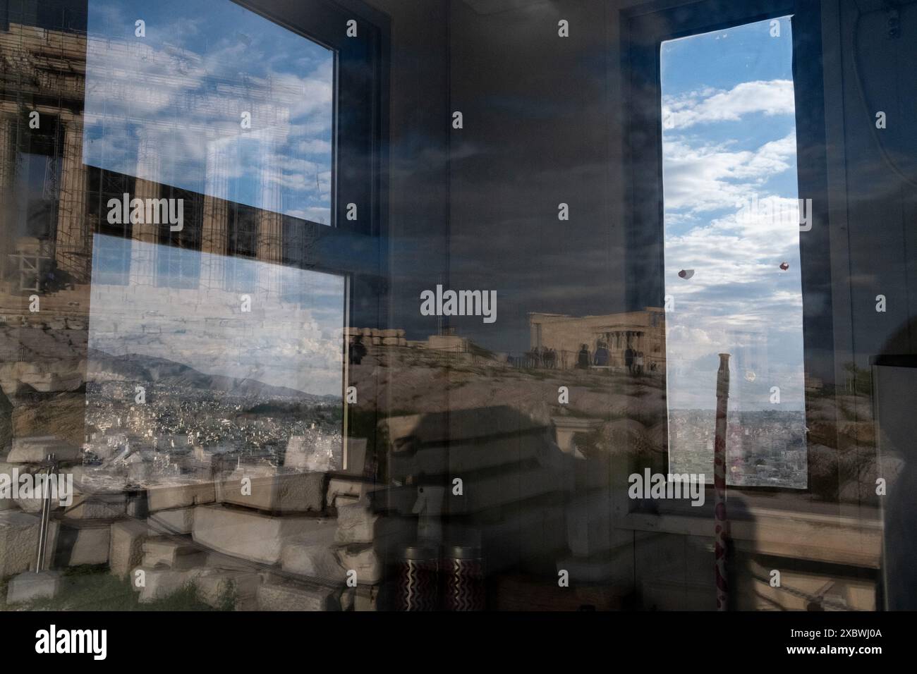 Reflection of the Parthenon temple on the Acropolis and the city of ...