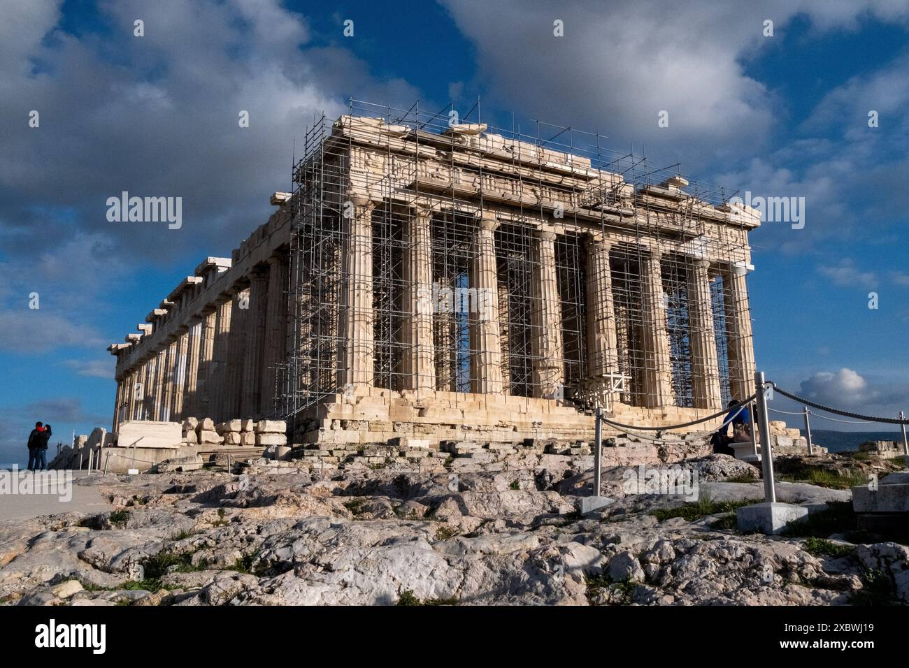 The Parthenon temple with a facade under construction with scaffolding ...