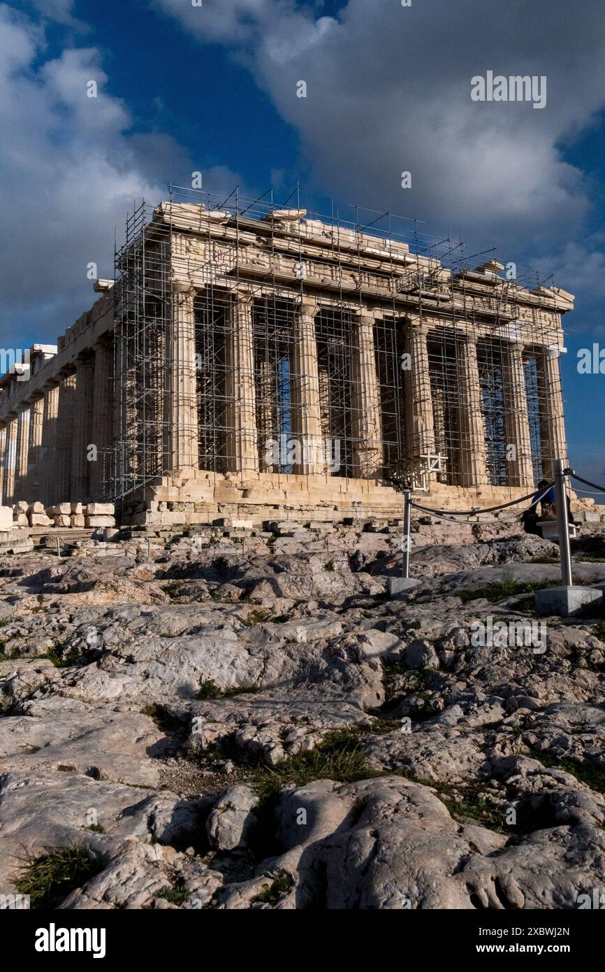 The Parthenon temple with a facade under construction with scaffolding on the Acropolis in ...