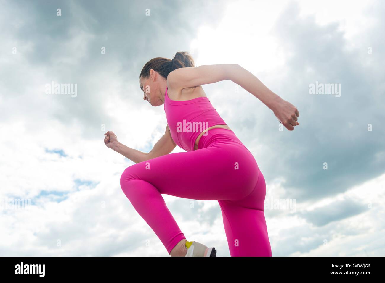 Dramatic low angle view running hi-res stock photography and images - Alamy