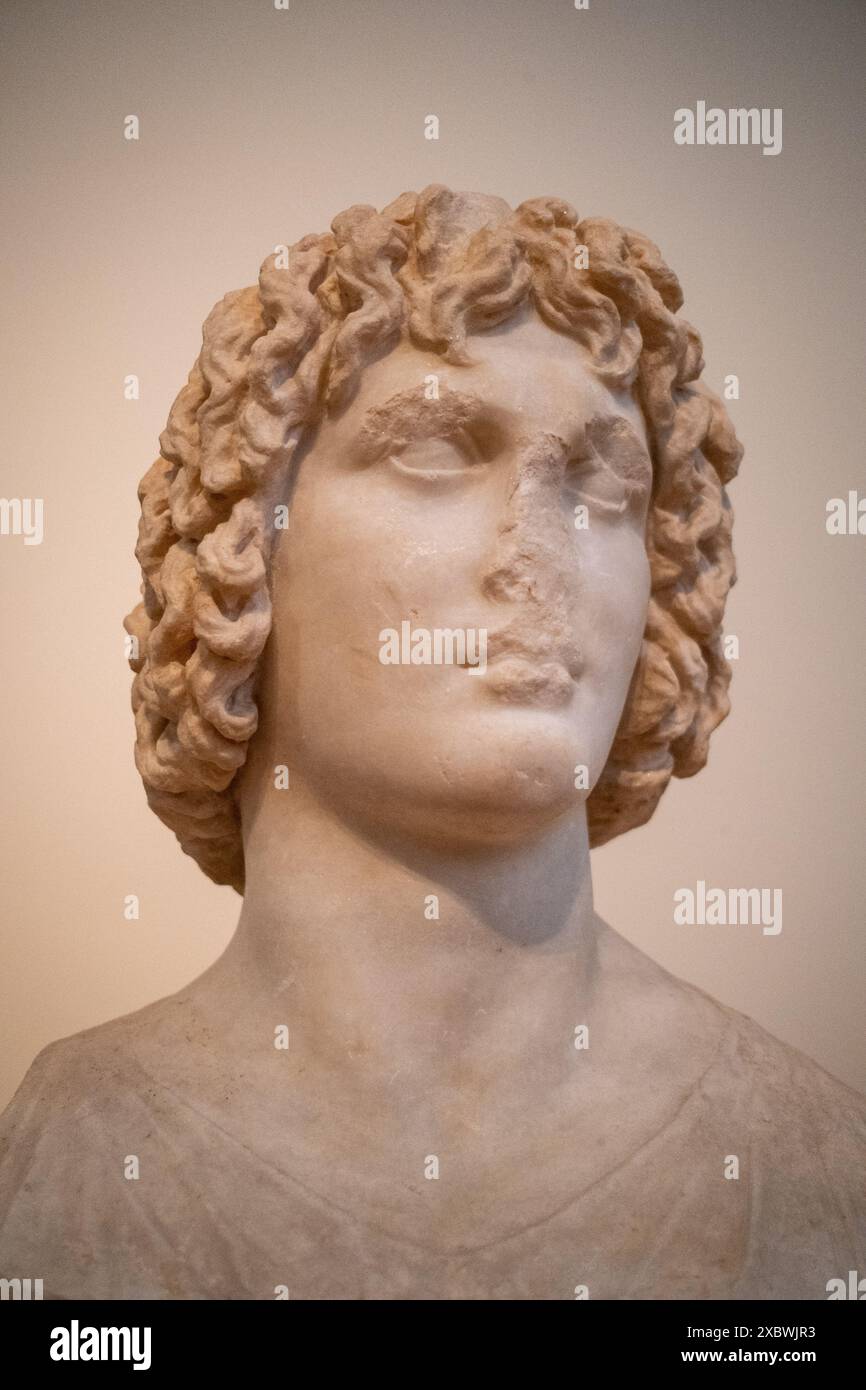 An ancient statue of a noseless face in white marble at the National ...