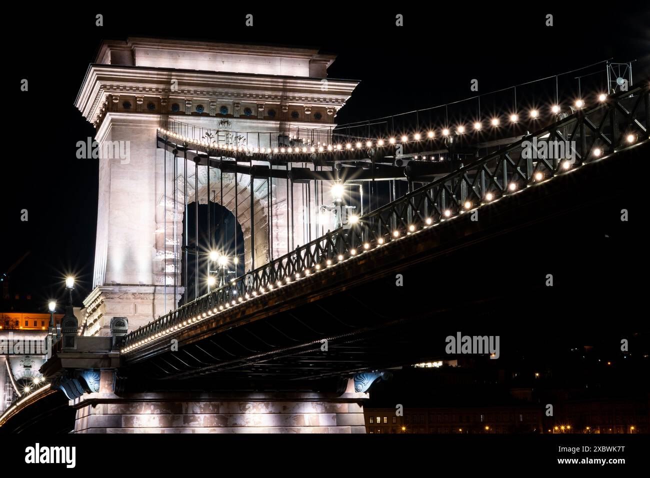 The historic Chain Bridge illuminated at night in Budapest Stock Photo ...