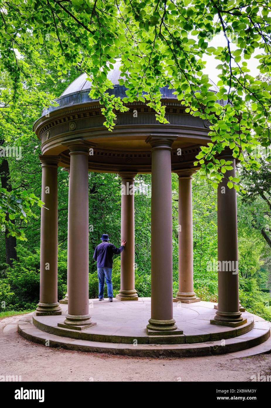 Man standing in The Temple of Fame at Studley Royal, Fountains Abbey ...