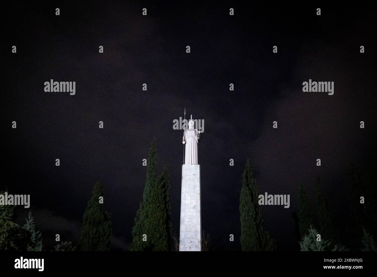 Night view of a colossal statue of Athena Parthenos, goddess of war in ...