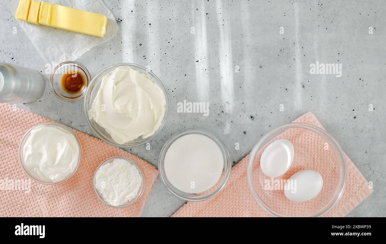 Cheesecake recipe. Ingredients close-up on the kitchen table. Cream ...