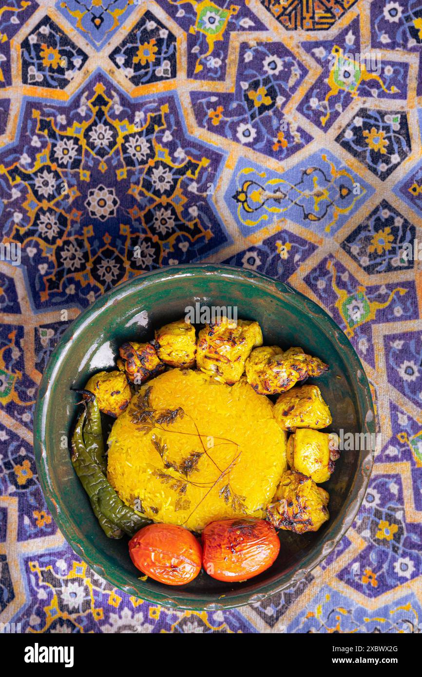 Authentic Iranian chicken kebab with saffron rice and grilled chilies ...